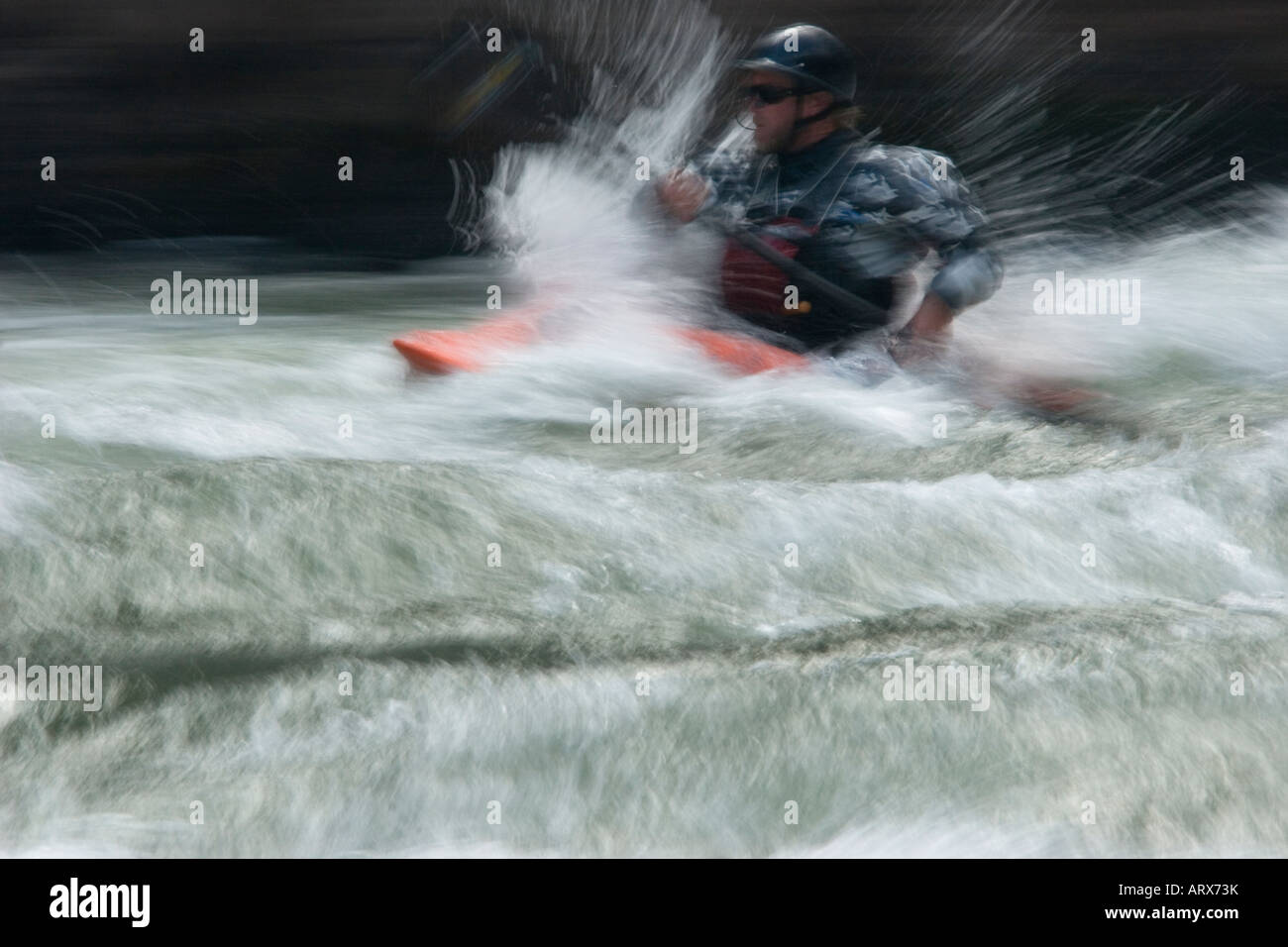 Man paddles kayak through waves Grand Canyon National Park MR Stock ...