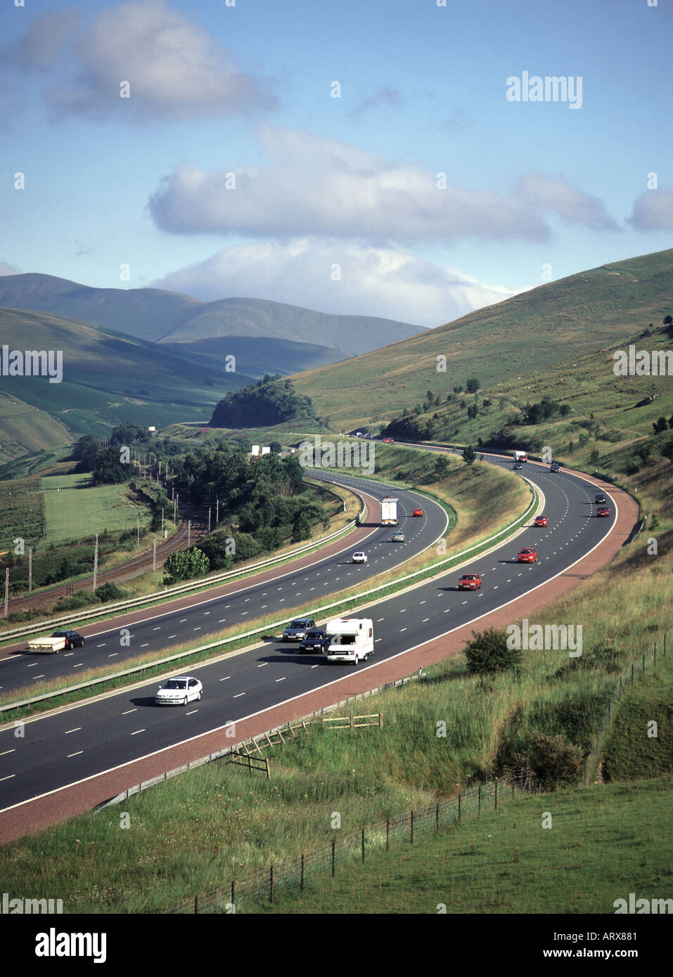 M6 motorway and railway line passing through scenic area on the fringes ...