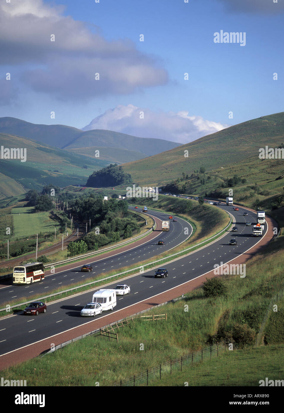 M6 motorway and railway line passing through scenic area on the fringes ...