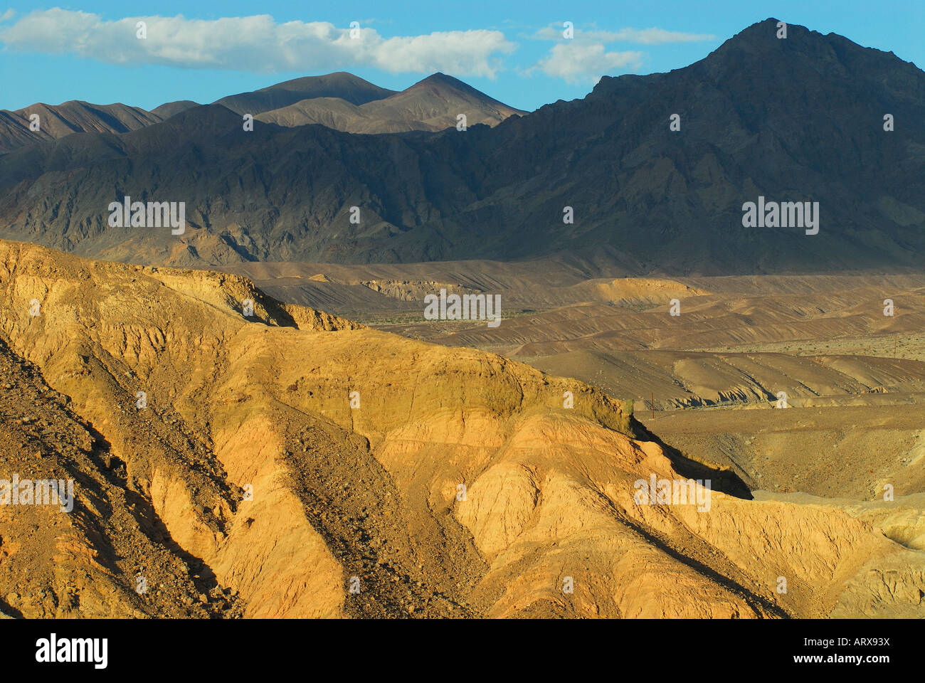 Death Valley Late afternoon with cloud over one mountain Stock Photo ...