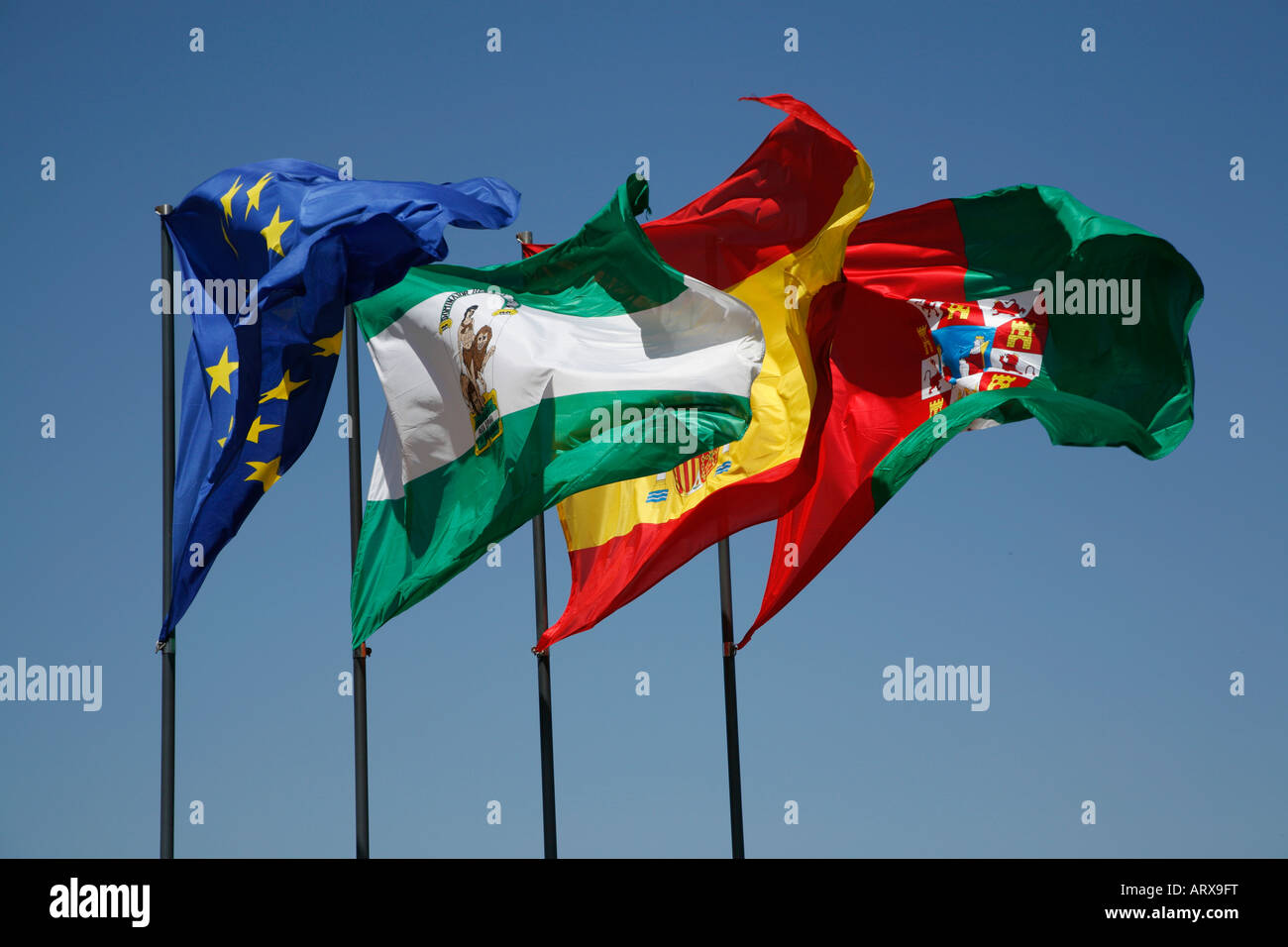 EU, Spain, Andalusia Flags against the blue sky, Granada, Andalusia ...