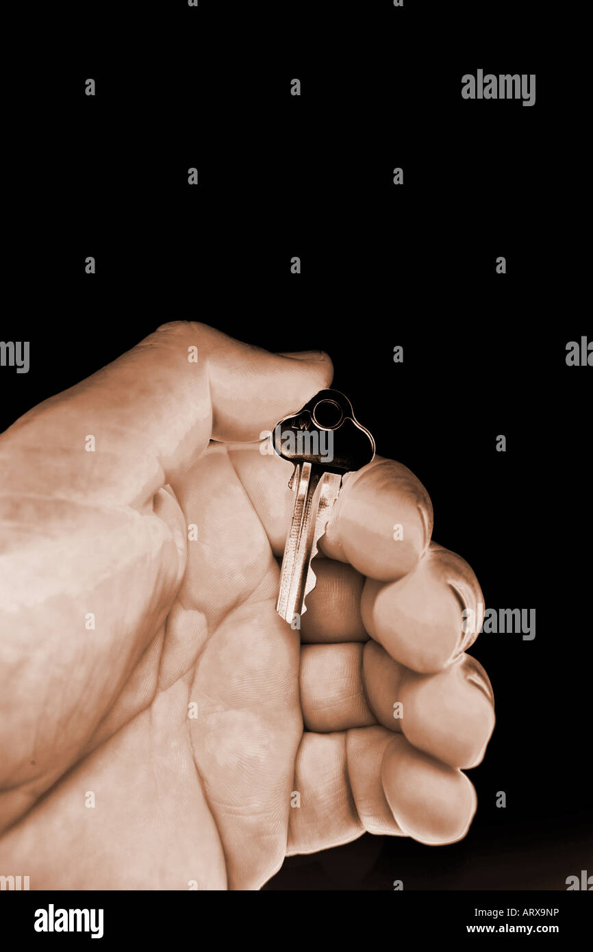 Key in hand Stock Photo - Alamy