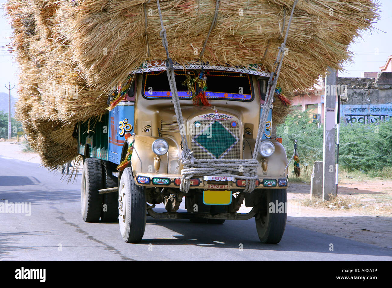 overloaded truck on highway rajasthan india Stock Photo - Alamy