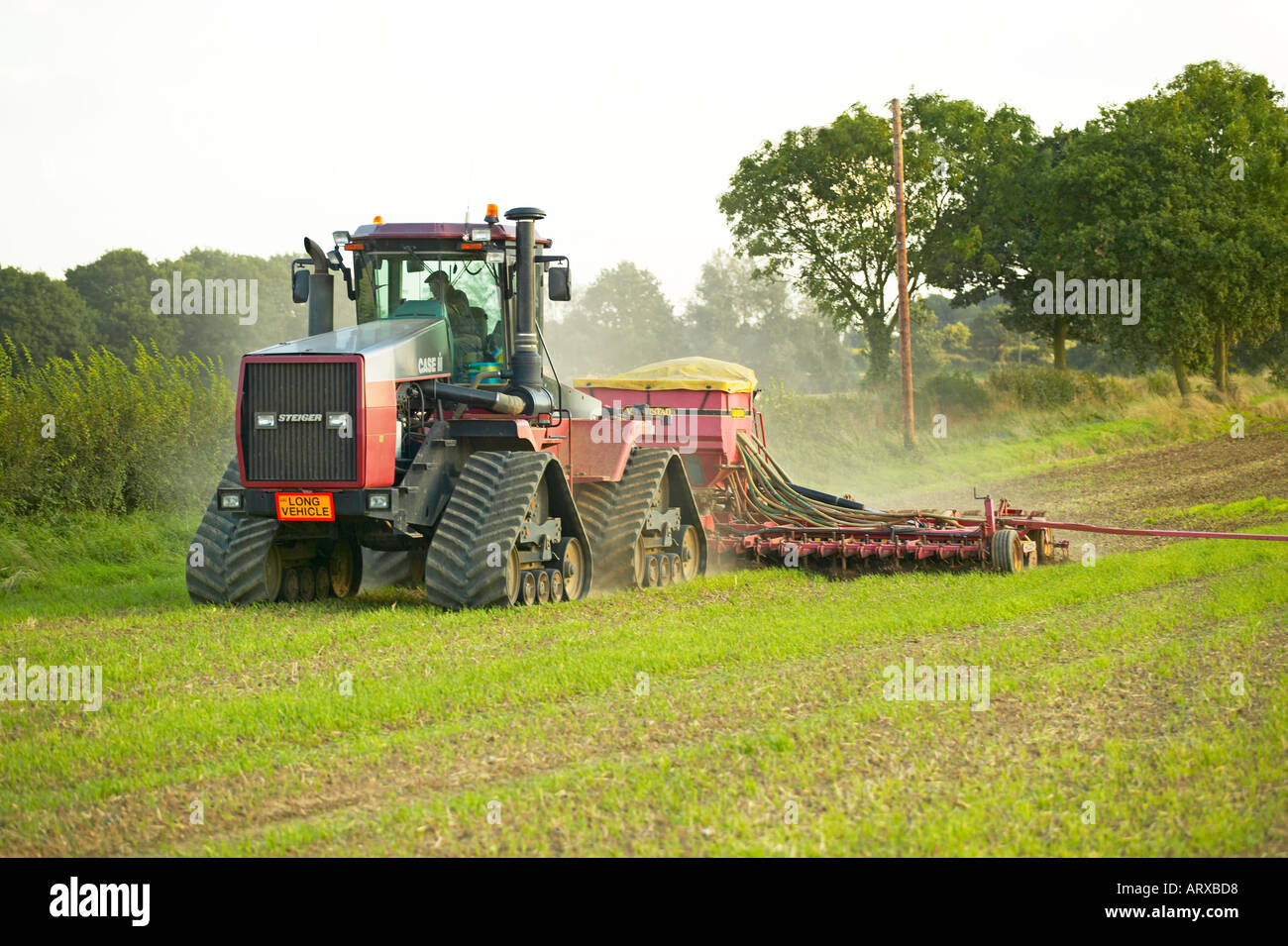tractor with seed drill Stock Photo - Alamy