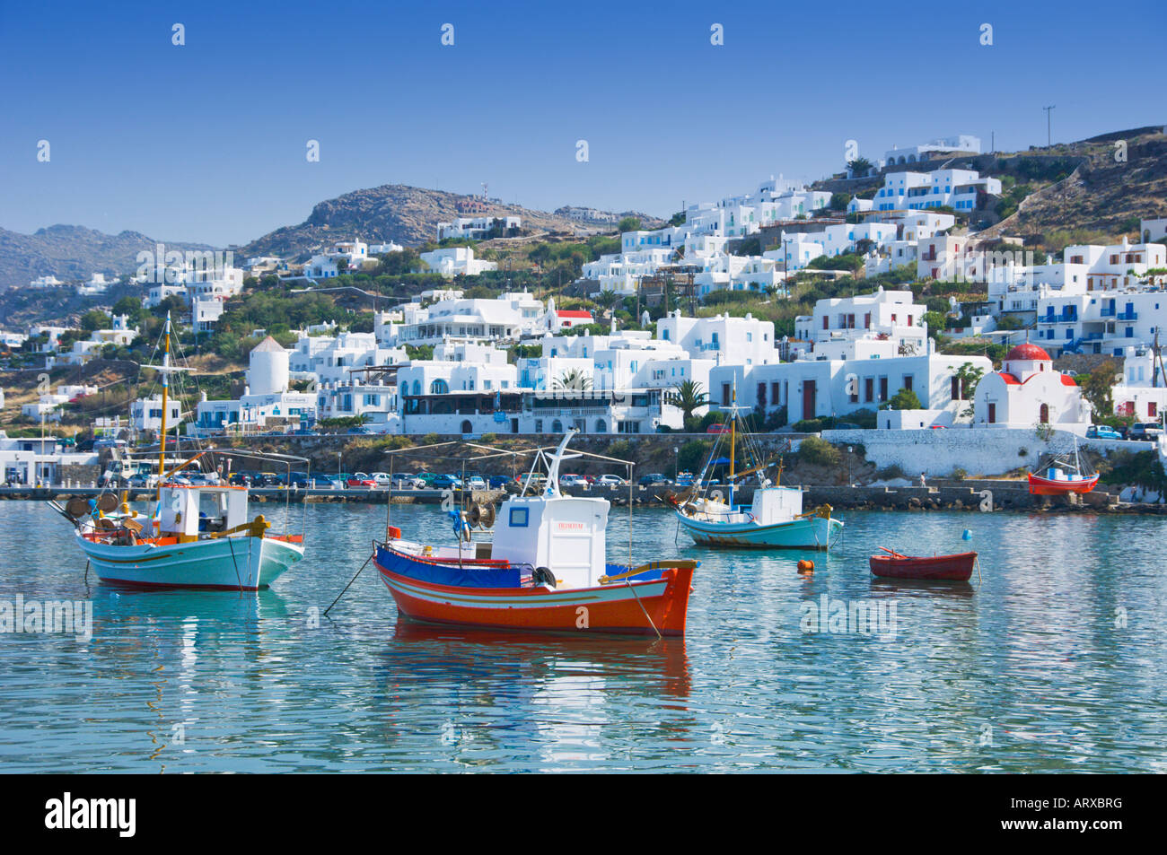 The port of Hora with colorful fishing boats on the Greek Island of ...