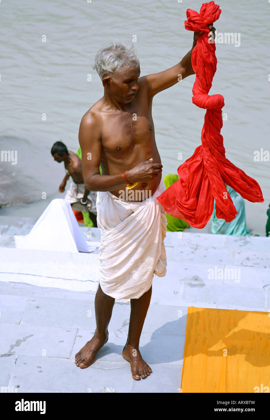 washerman at banks of ganges rishikesh india Stock Photo - Alamy
