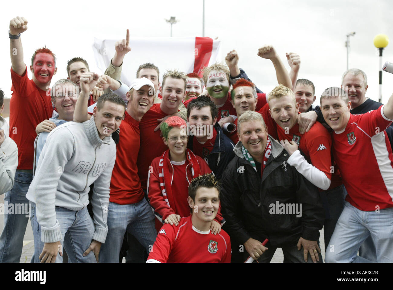 Welsh football fans at Match Cardiff South Wales Stock Photo - Alamy