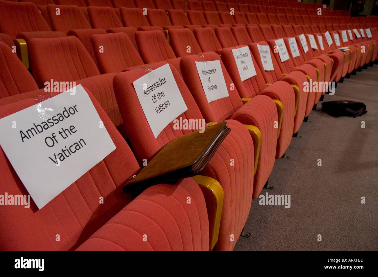 Israel Jerusalem Theatre concert hall row of chairs with stuck papers ...