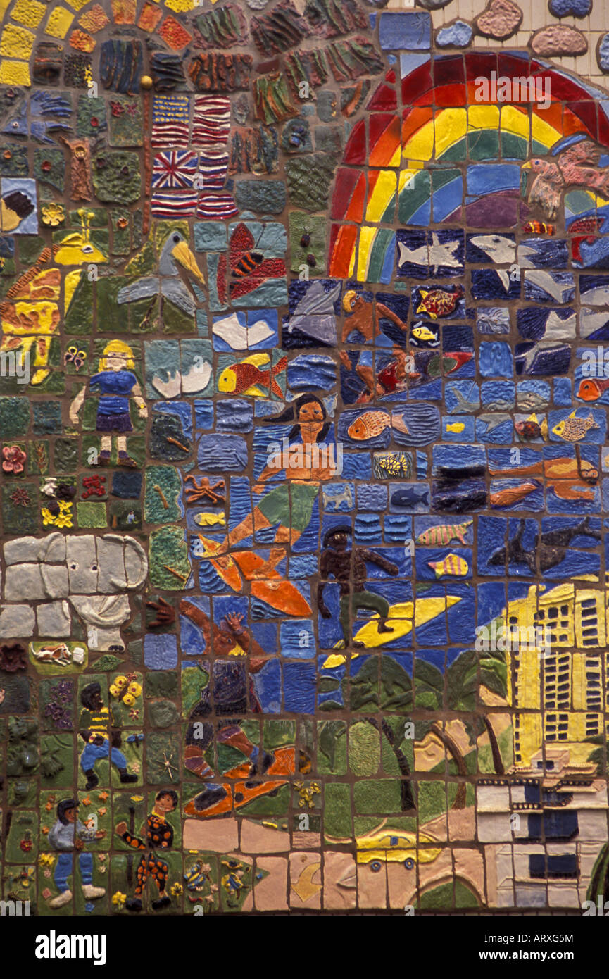A colorful tile mural depicts fun activities and scenic views in ...