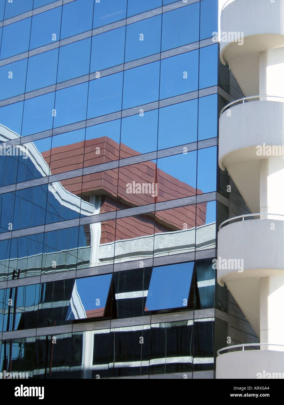 reflection on glass office building Stock Photo - Alamy