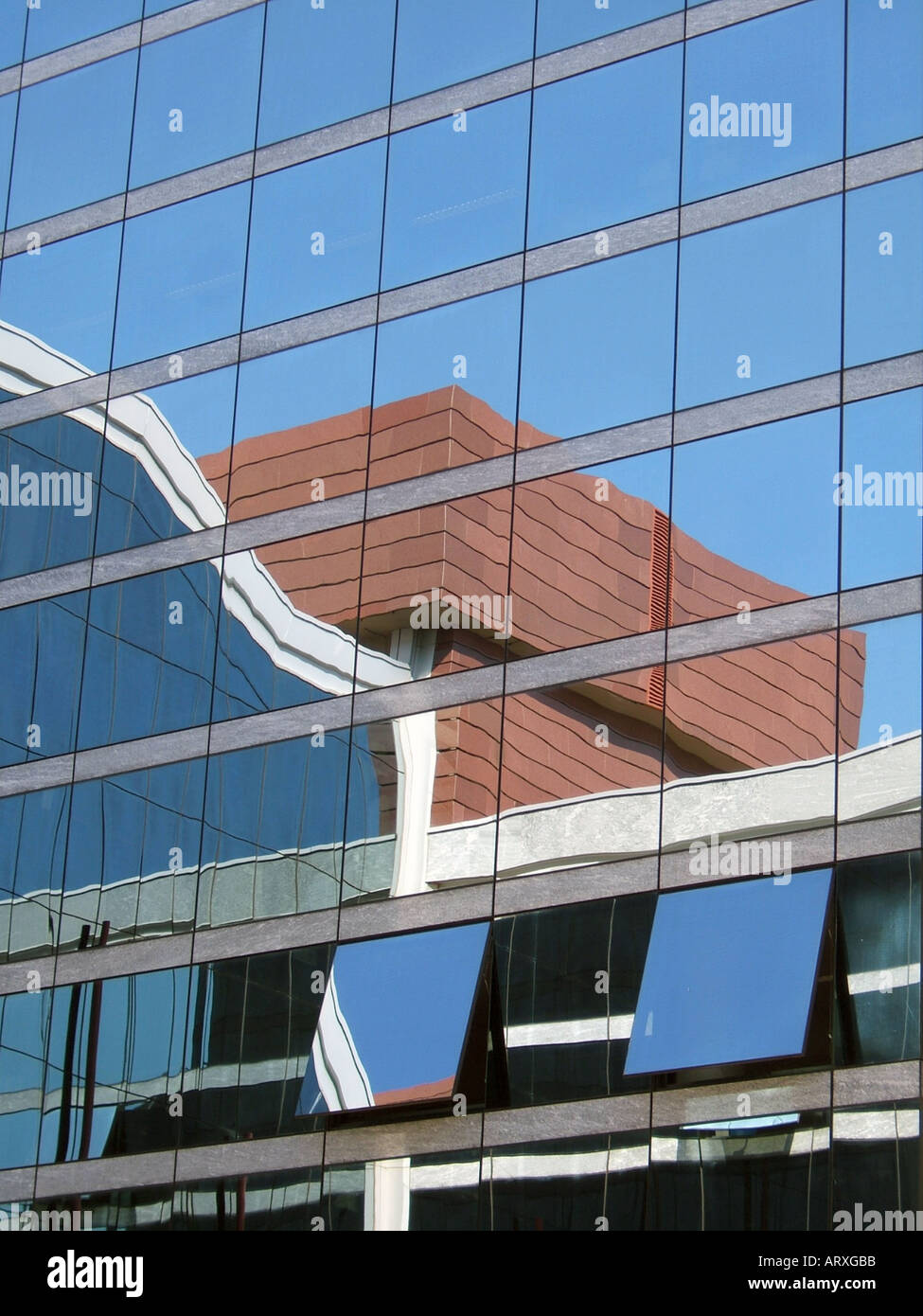 reflection on glass office building Stock Photo - Alamy