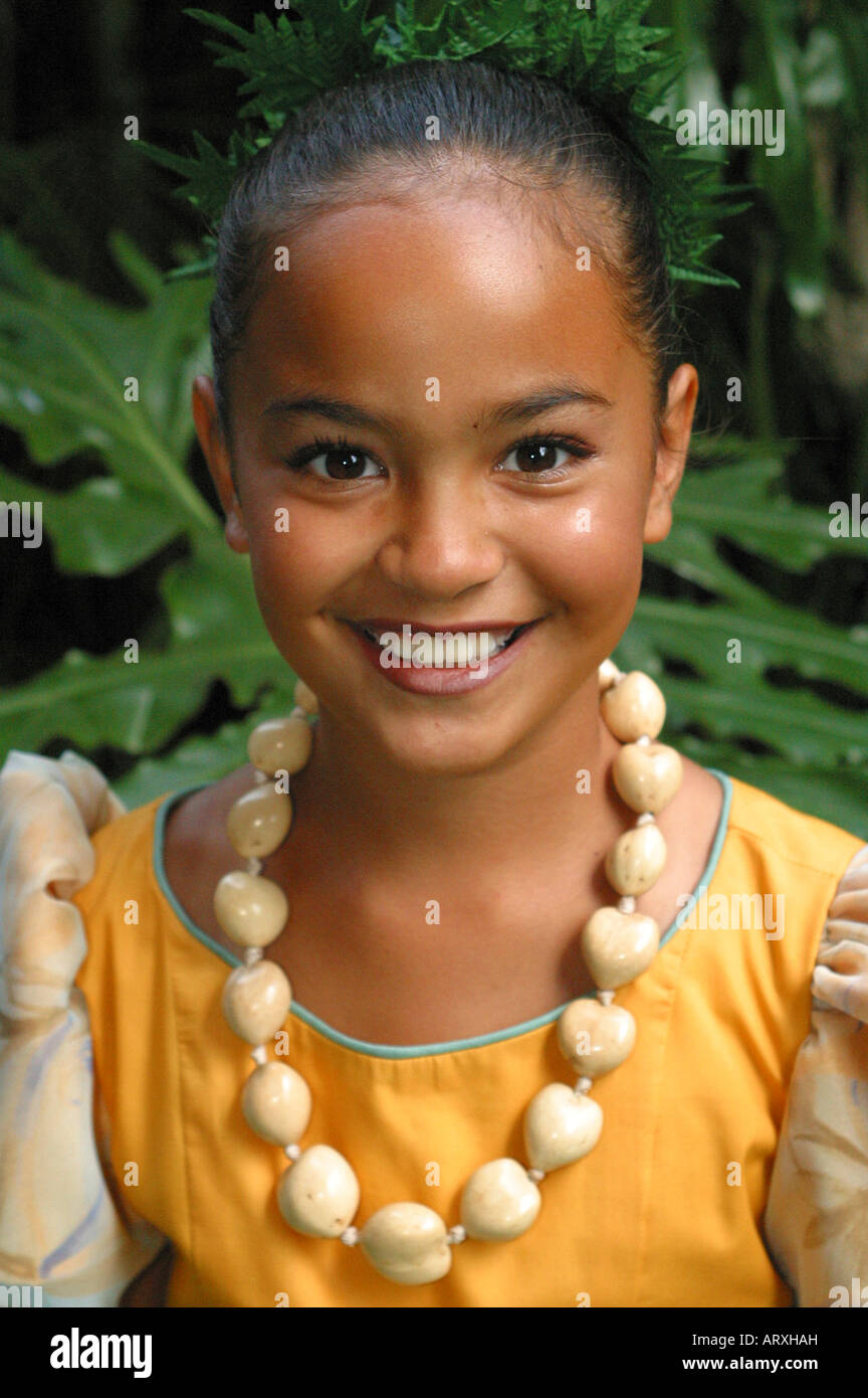 Polynesian girl wearing aloha wear with kukui nut lei. Smiling head and ...