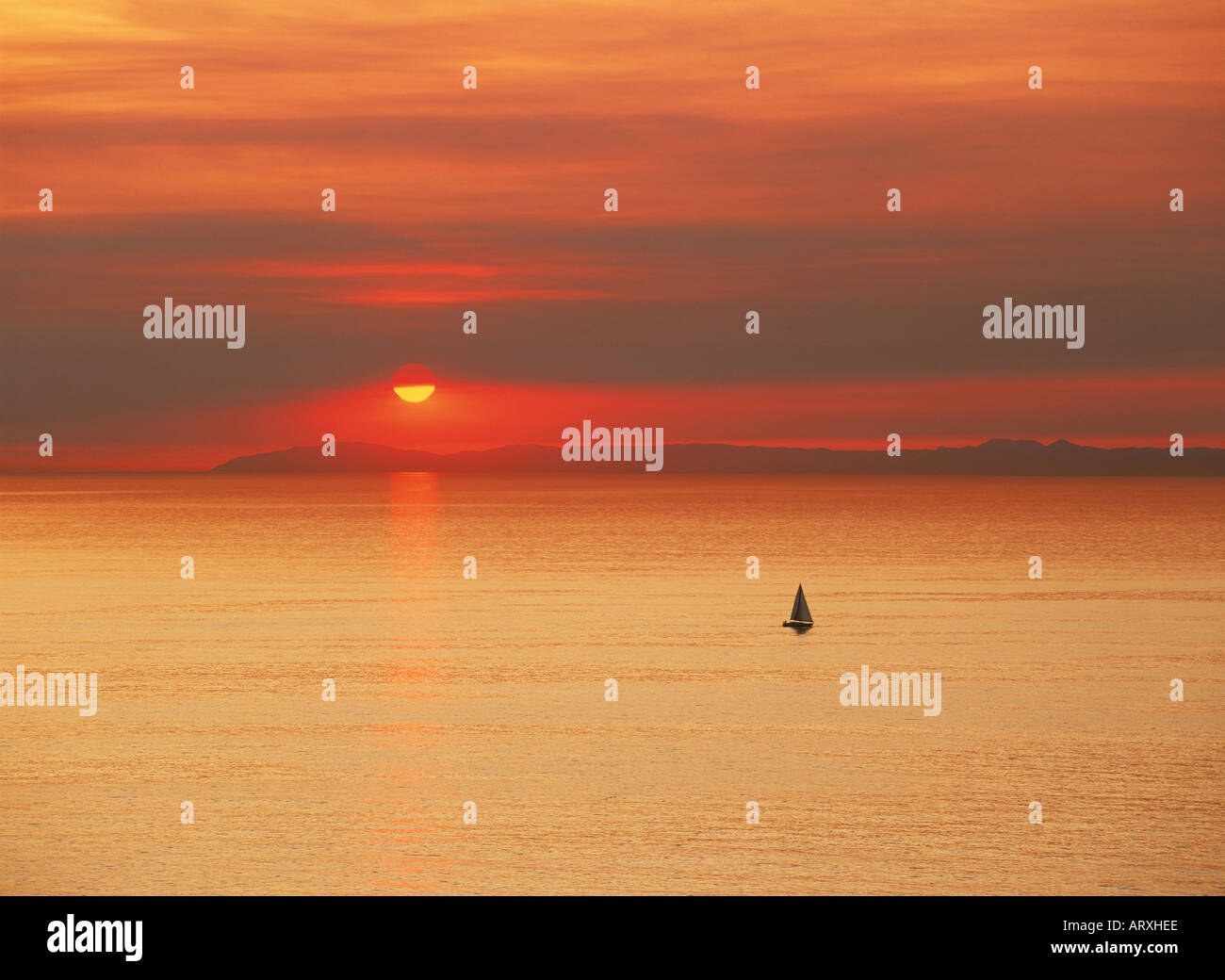 Sailboat sunset in ocean hi-res stock photography and images - Alamy