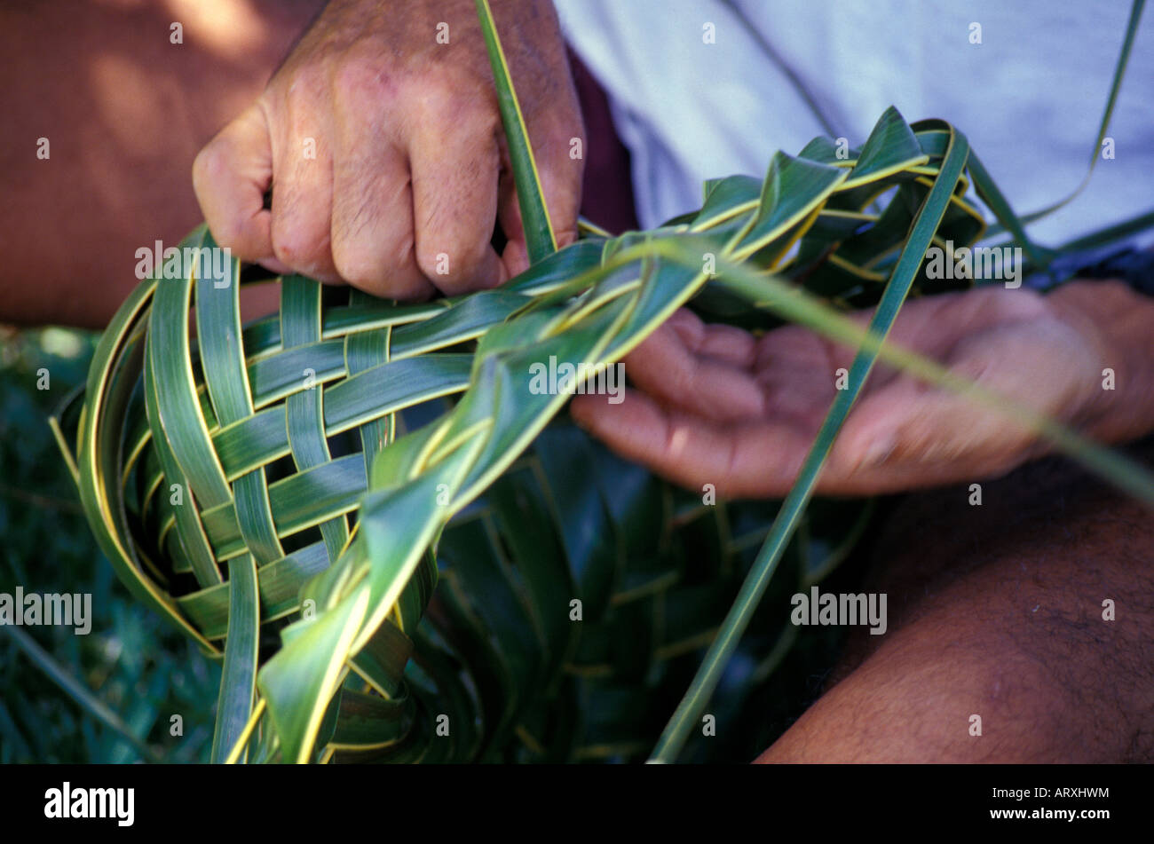 Hawaiian tradition of weaving hats Stock Photo - Alamy
