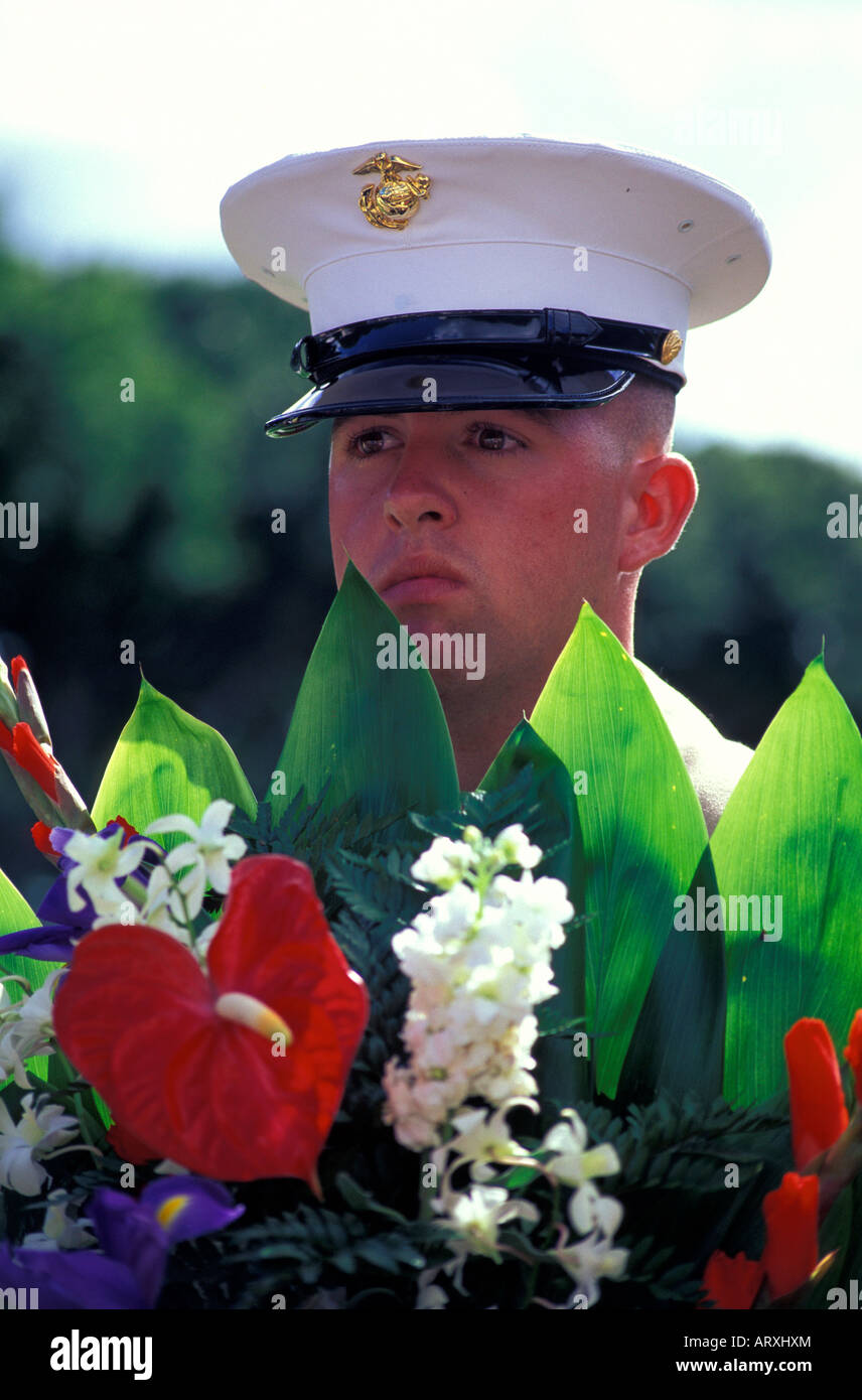 Soldier with flowers standing at Punchbowl Memorial on the Island of ...
