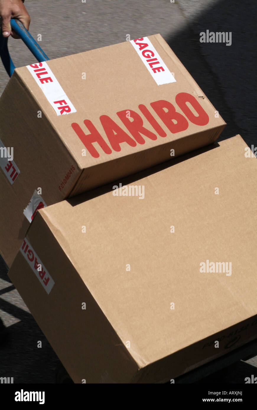 sack barrow sackbarrow trolley unloading unload Stock Photo - Alamy