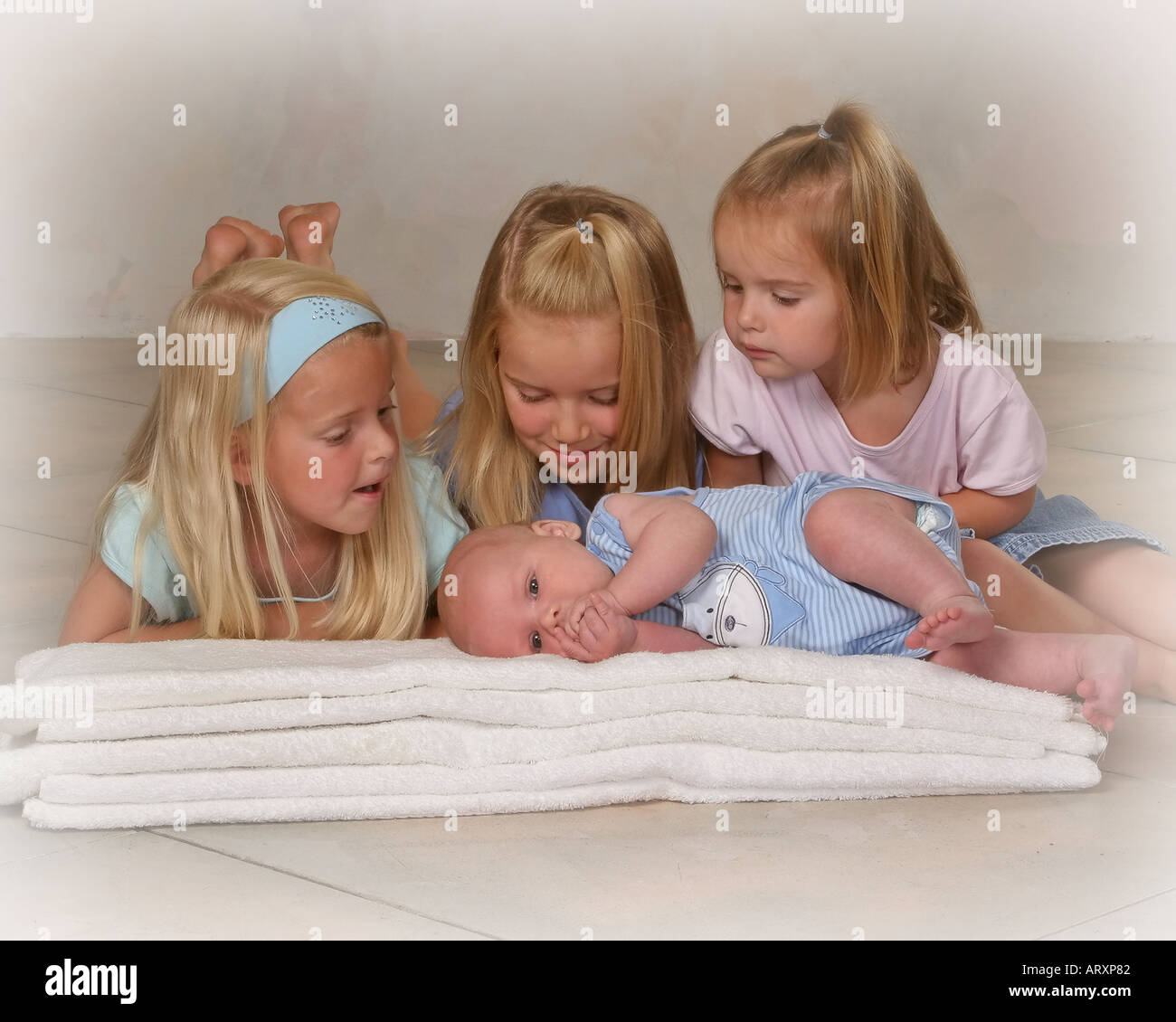 Three sisters with their baby brother at McMaster Studio Stock Photo ...