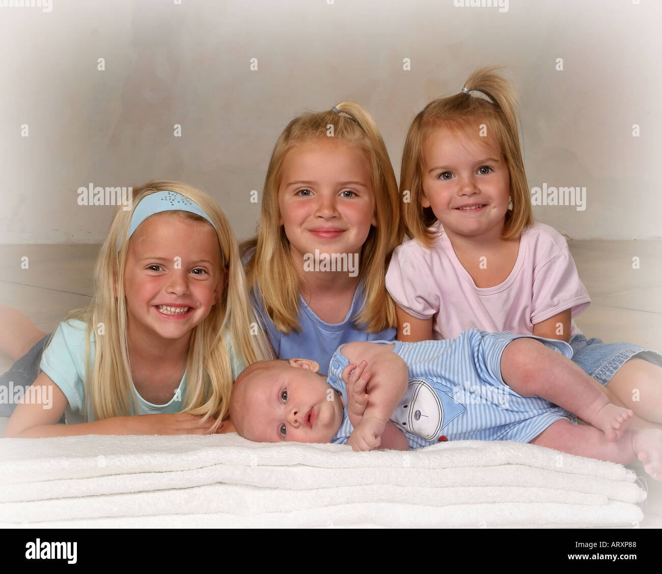 Three sisters with their baby brother at McMaster Studio Stock Photo - Alamy