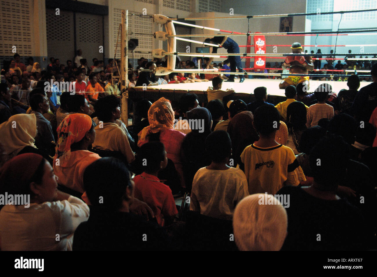 Mostly conservative Muslim audience gothered around the ring waiting ...