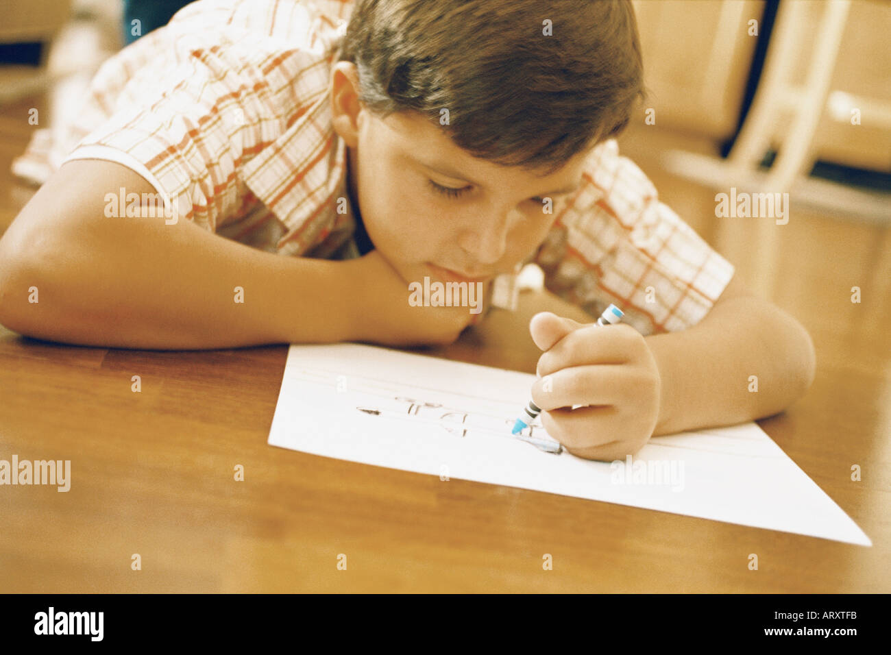Latino Boy Drawing Stock Photo - Alamy