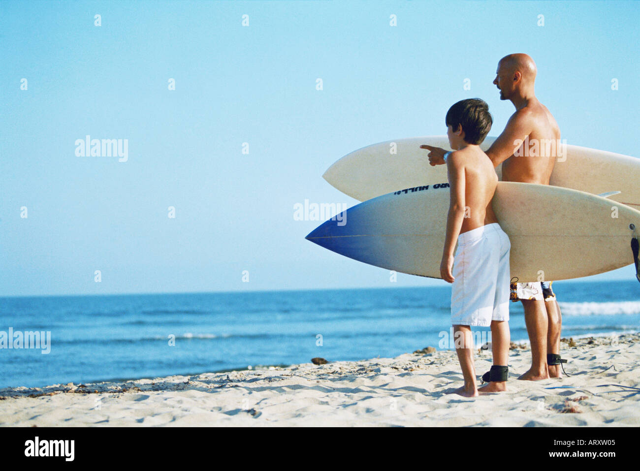 Father and Son Surfing Stock Photo - Alamy