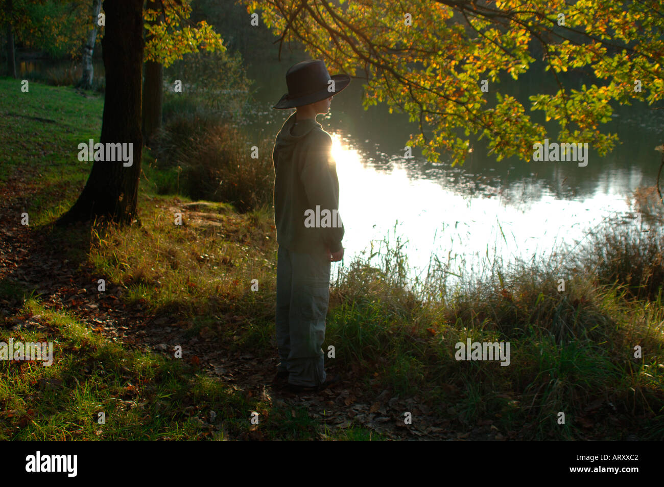 Young Boy Playing At Being An Explorer,In The Staffordshire Countryside ...