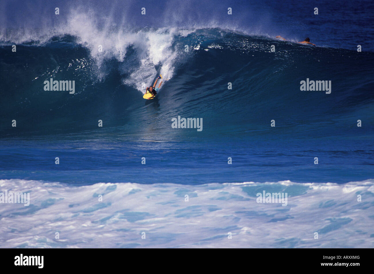 Body boarding at the north shore on Oahu Stock Photo - Alamy