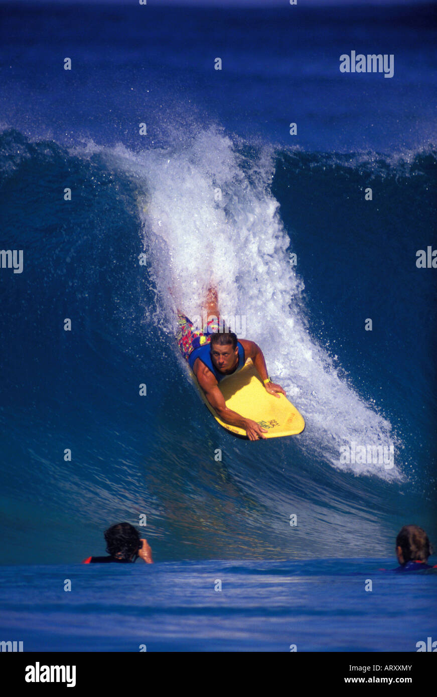 Body boarding in the beautiful blue waters of Oahu Stock Photo - Alamy