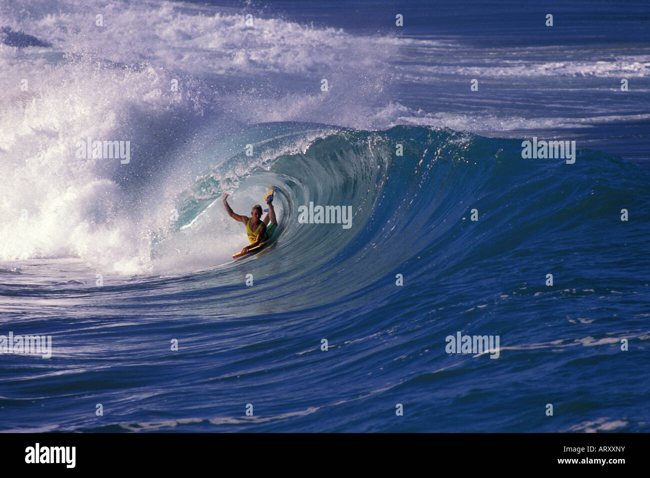 Body boarding at the north shore on Oahu Stock Photo - Alamy