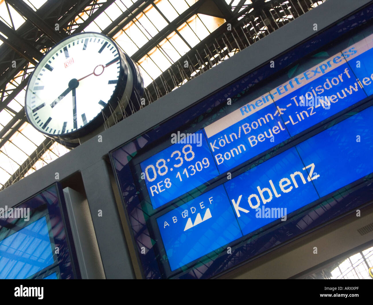Cologne Germany the main station with clock and timetable signs trains ...