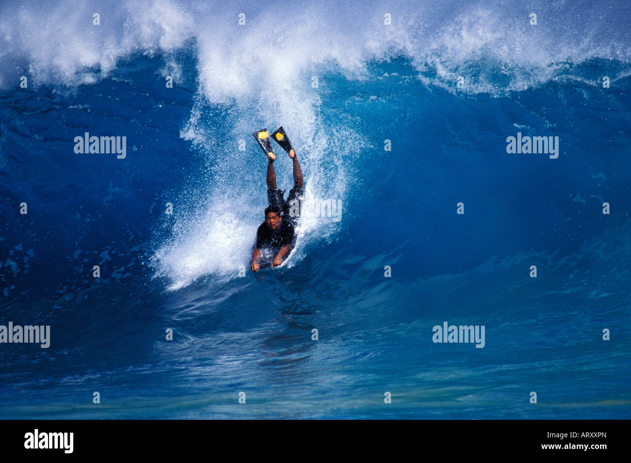 Body boarding at sandys beach on Oahu Stock Photo - Alamy