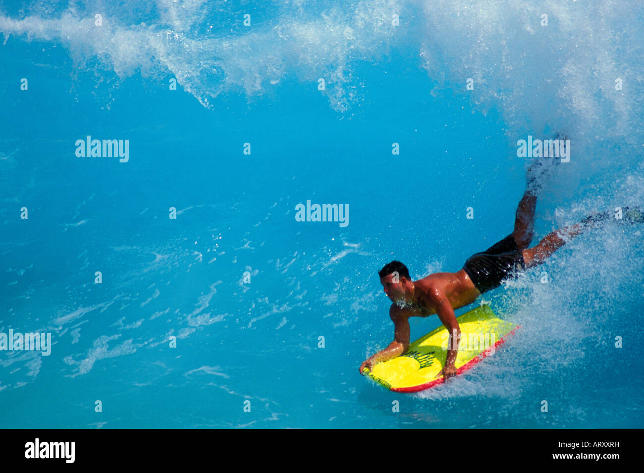 Body boarding at sandys beach on Oahu Stock Photo - Alamy