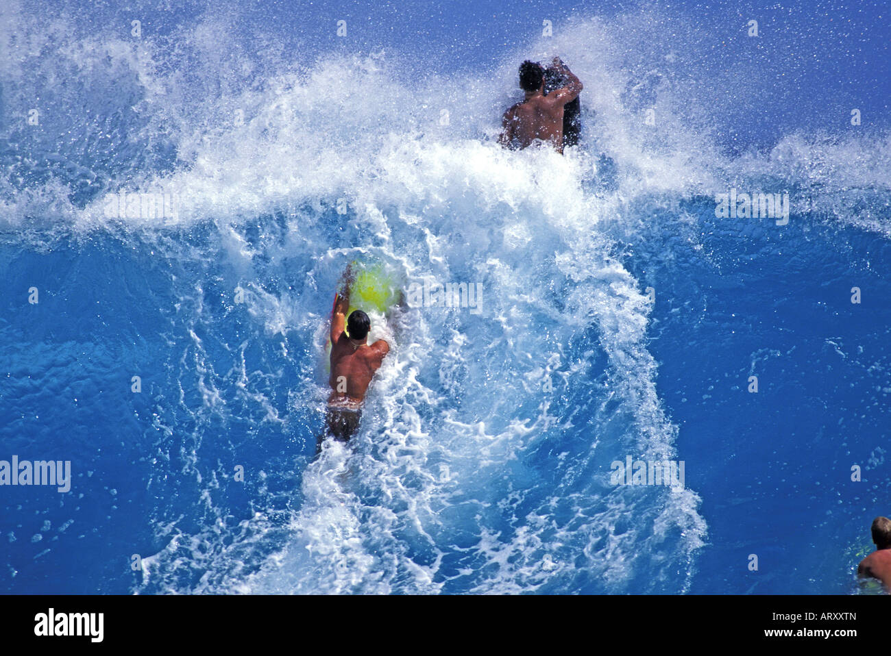 Body boarding at sandys beach on Oahu Stock Photo - Alamy