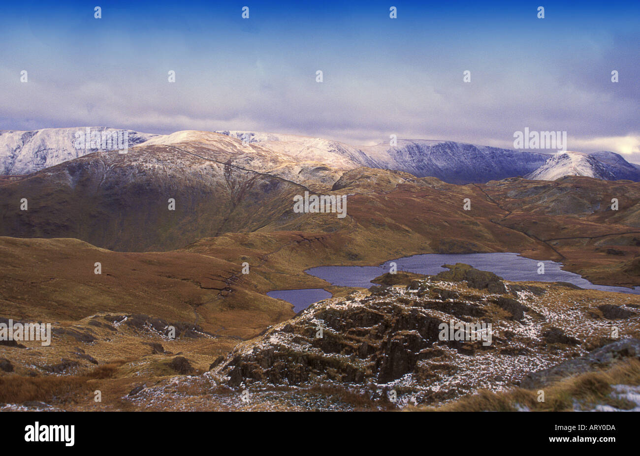 Angle Tarn and surrounding Fells with a dusting of snow Stock Photo - Alamy