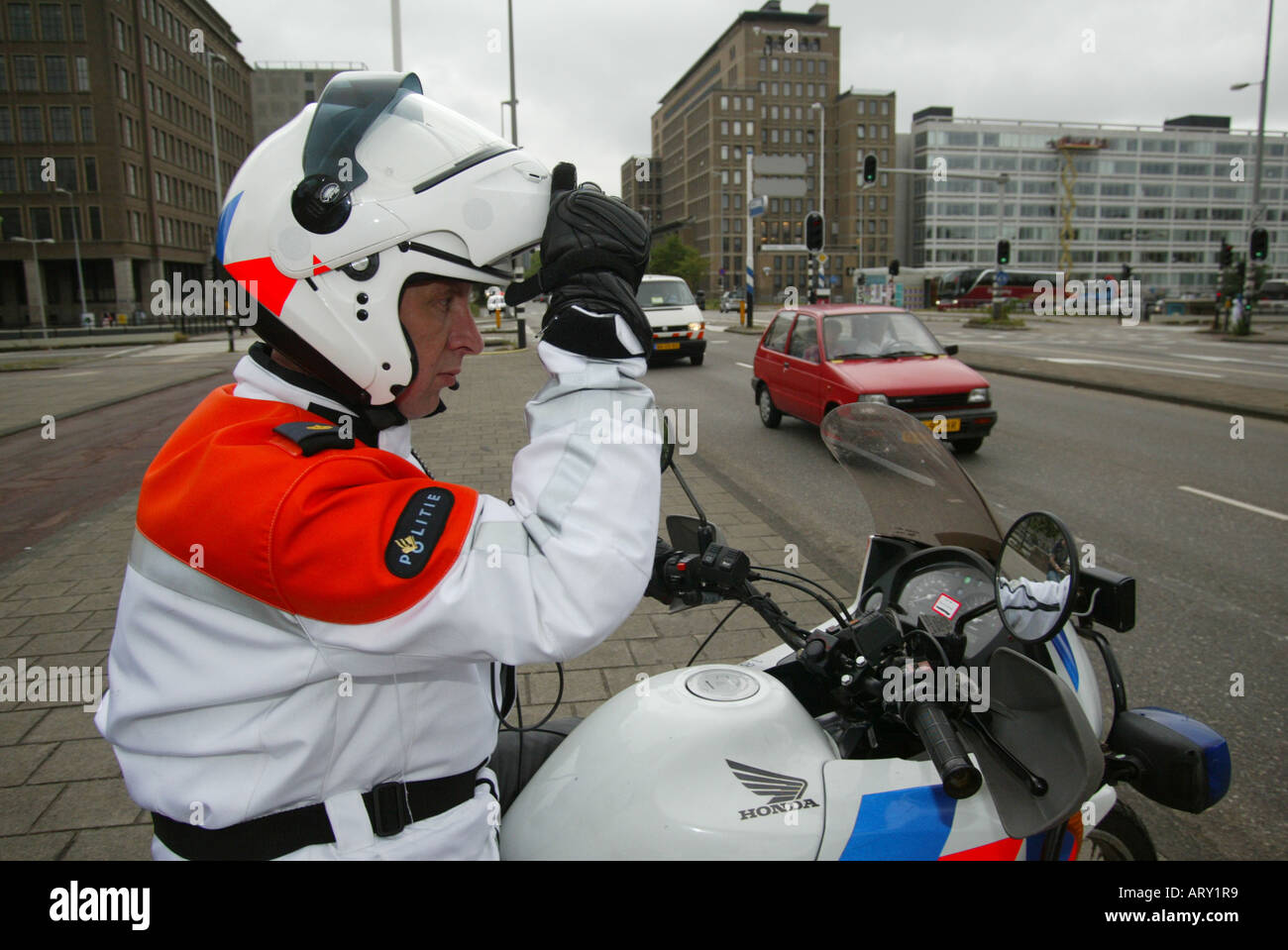 Person on motorcycle with helmet hi-res stock photography and images ...