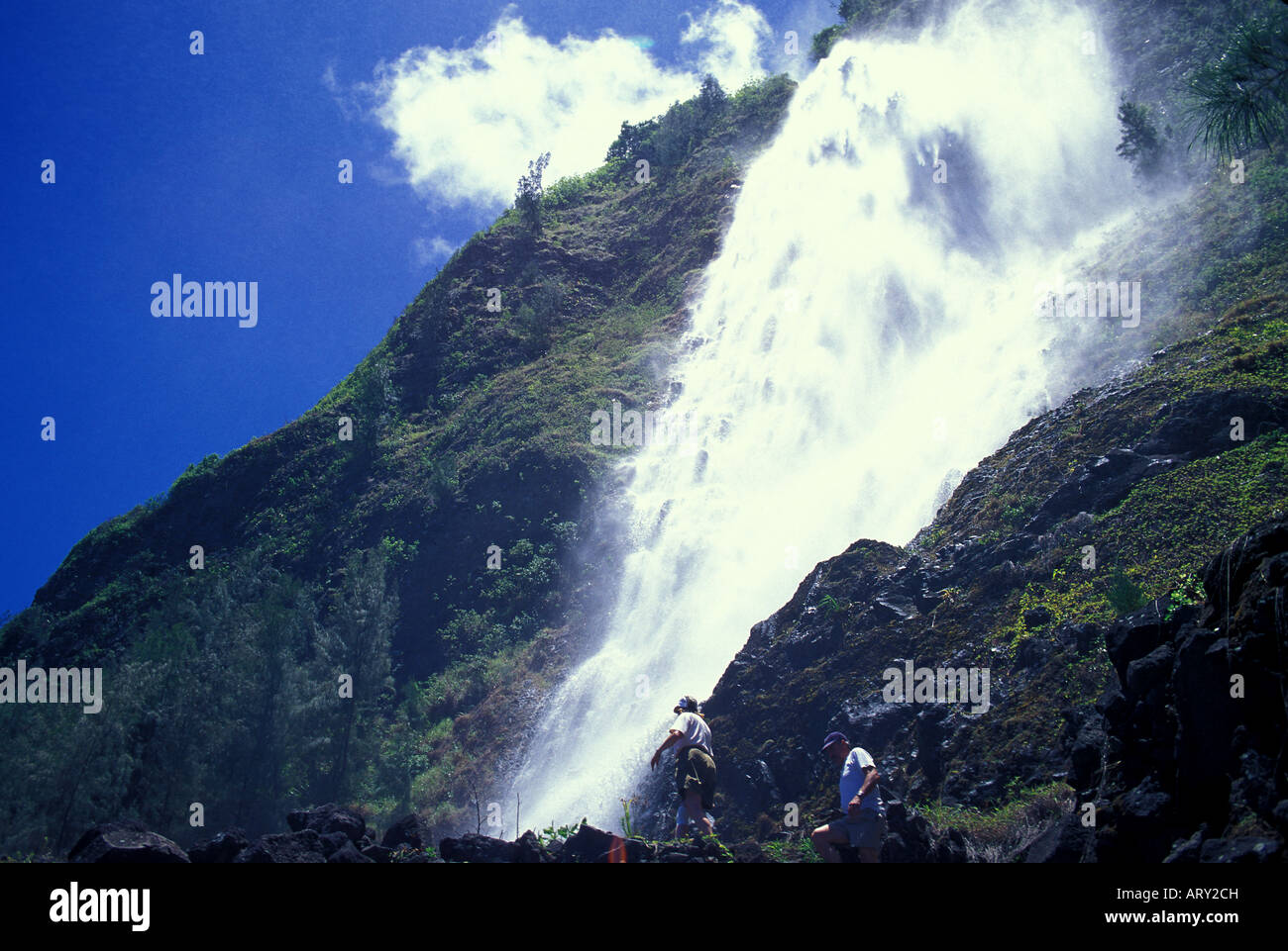 Visitors get a close look at Kaluahina Falls, reached from Waipio's ...