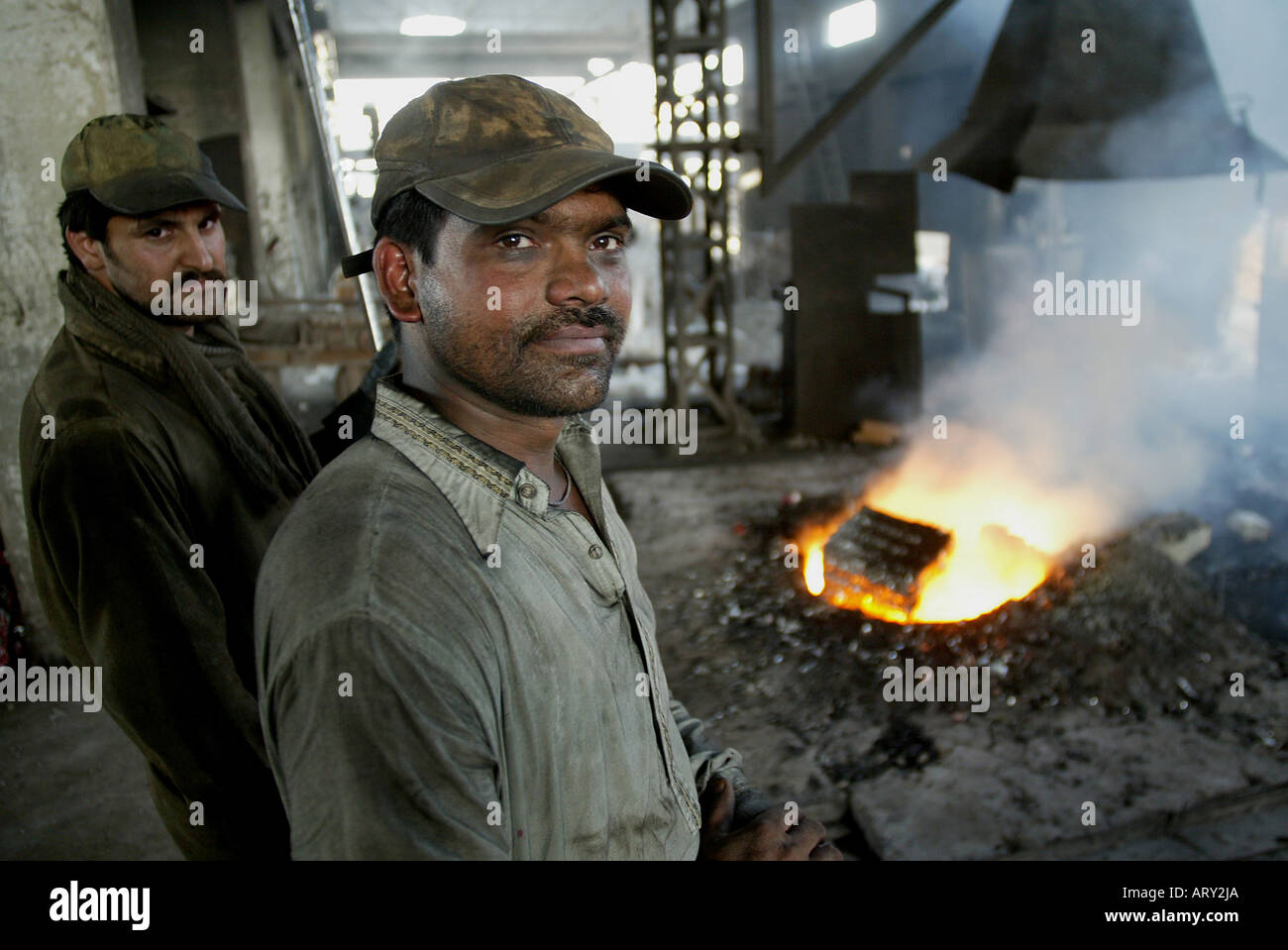 risky work in steel factories in islamabad, Pakistan Stock Photo - Alamy
