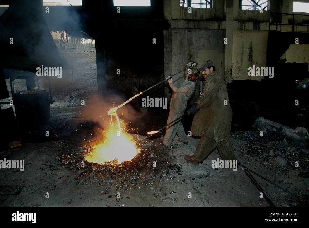 risky work in steel factories in islamabad, Pakistan Stock Photo - Alamy