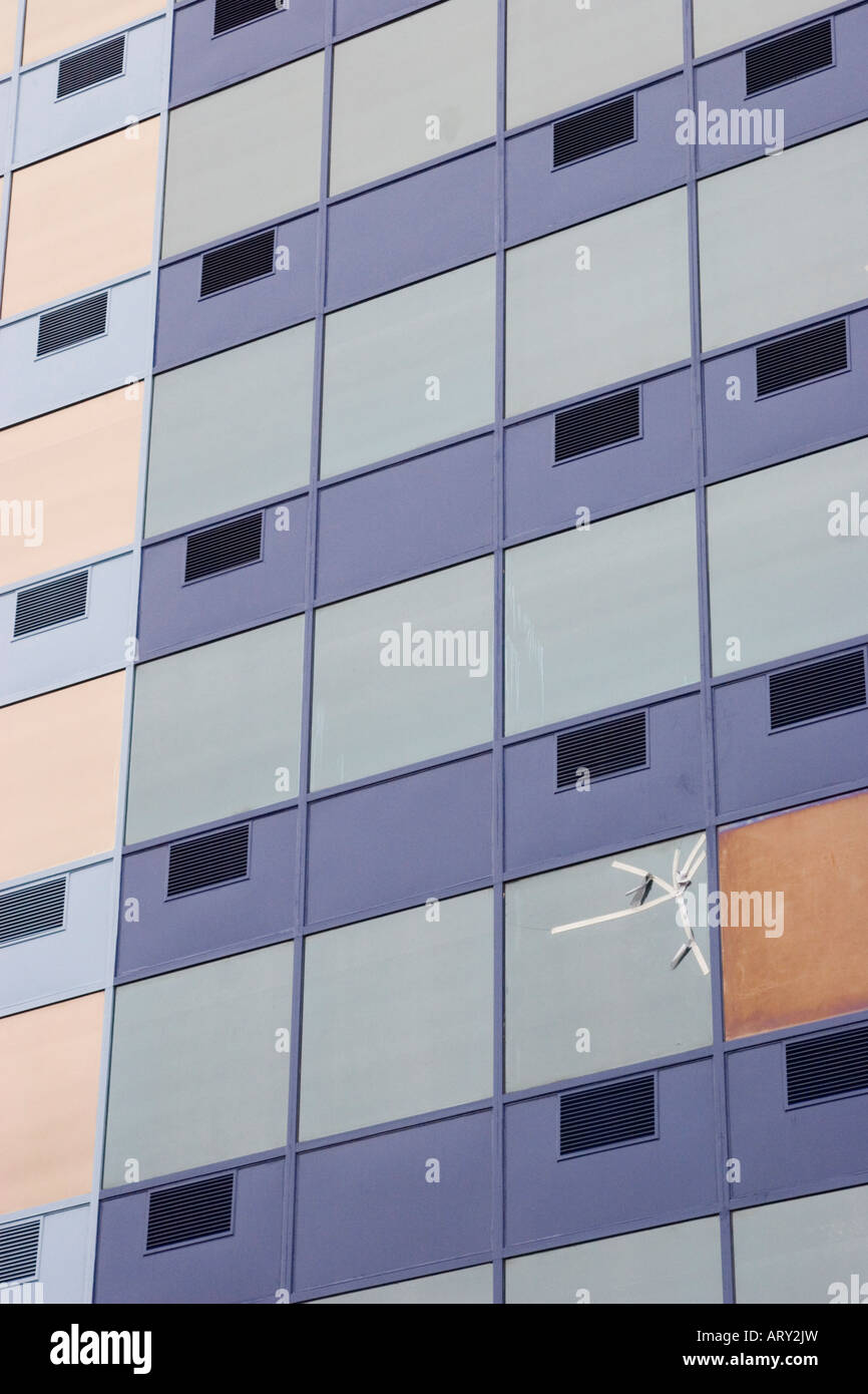 Modern glass tower block with broken window in Newport Stock Photo - Alamy