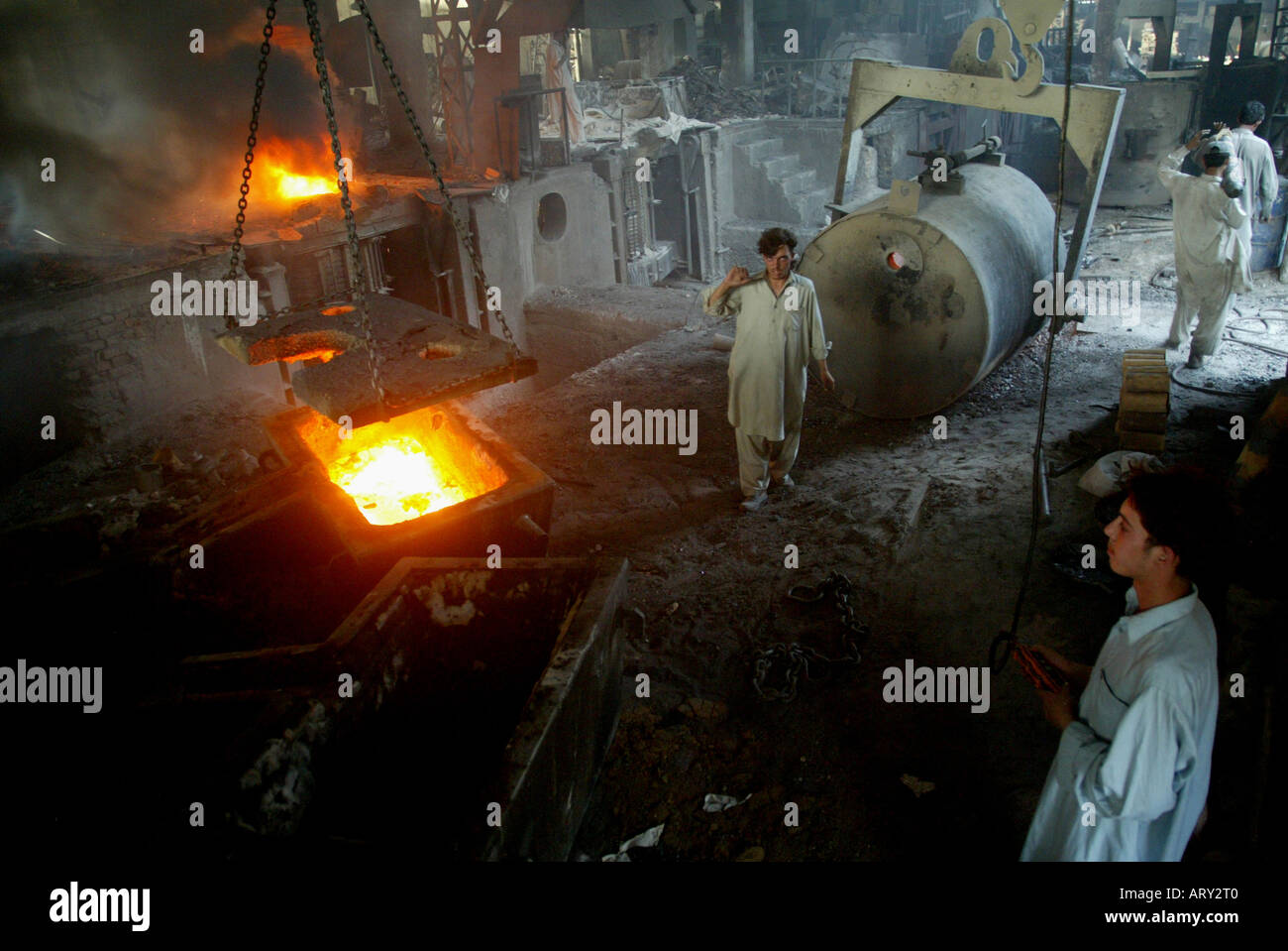 risky work in steel factories in islamabad, Pakistan Stock Photo - Alamy