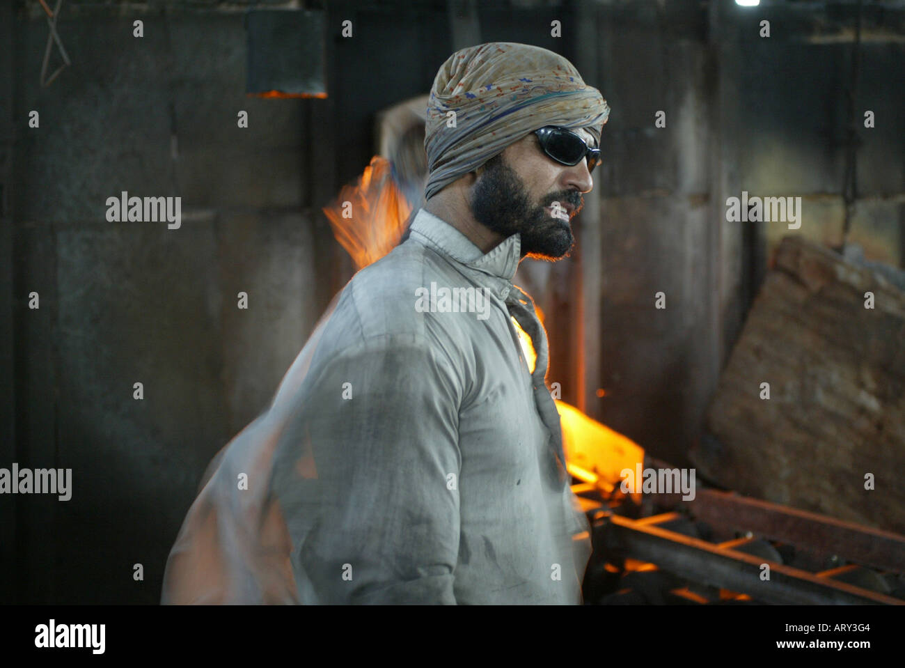 risky work in steel factories in islamabad, Pakistan Stock Photo - Alamy