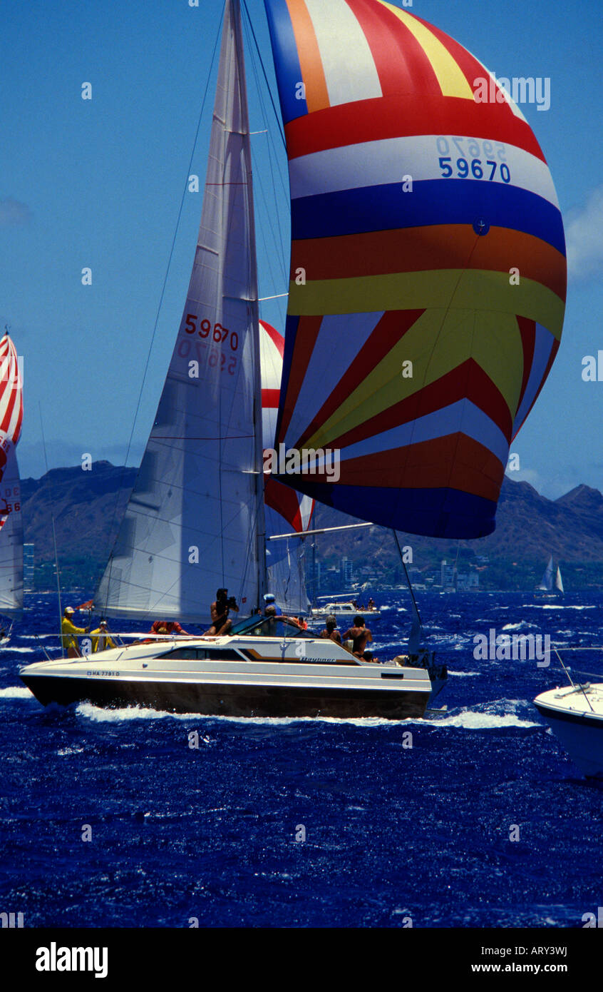Sailboat and its crew sailing on deep blue ocean during the 1984 Pan Am ...