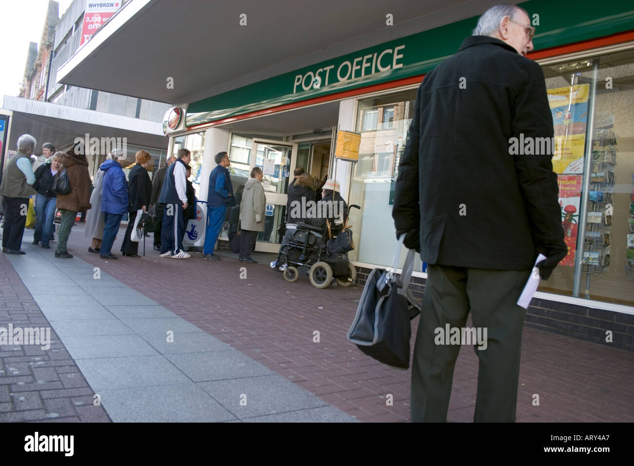 Post office with queue of elderly customers in Southend Essex UK Stock ...