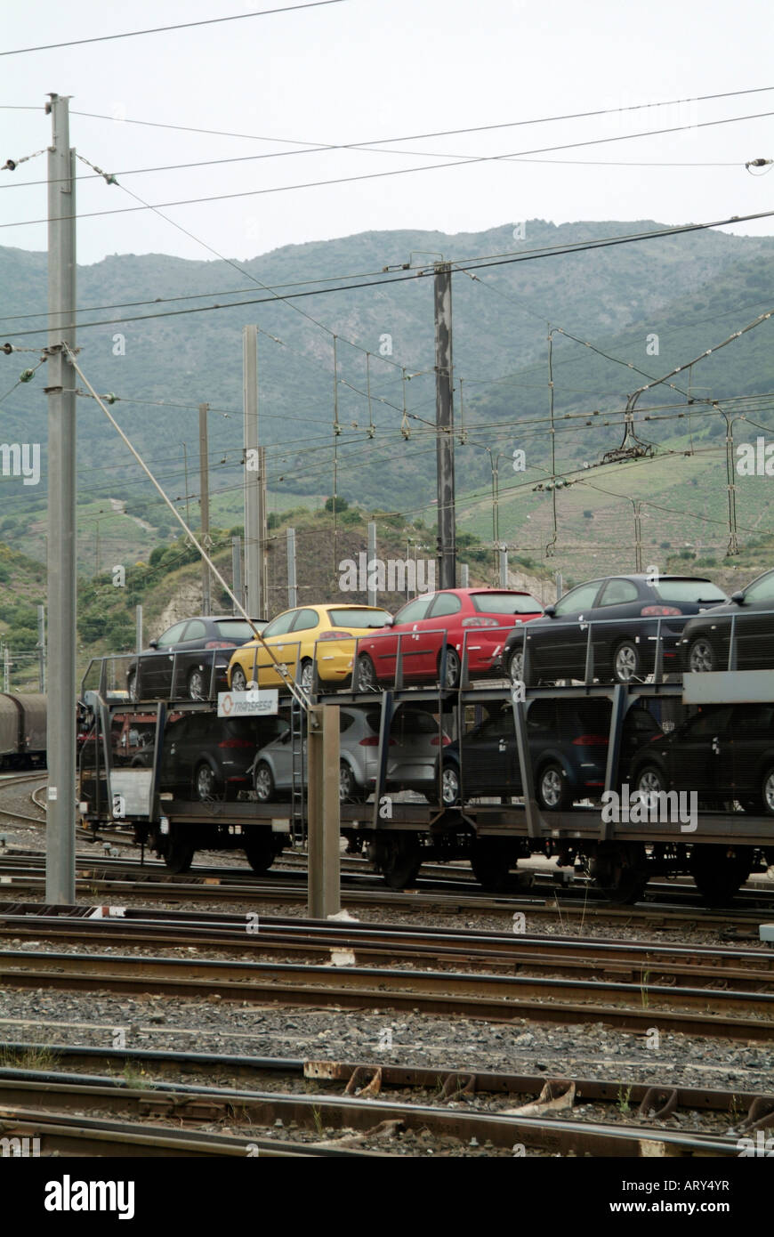 new cars being transported by train seat railway rail car seat in ...