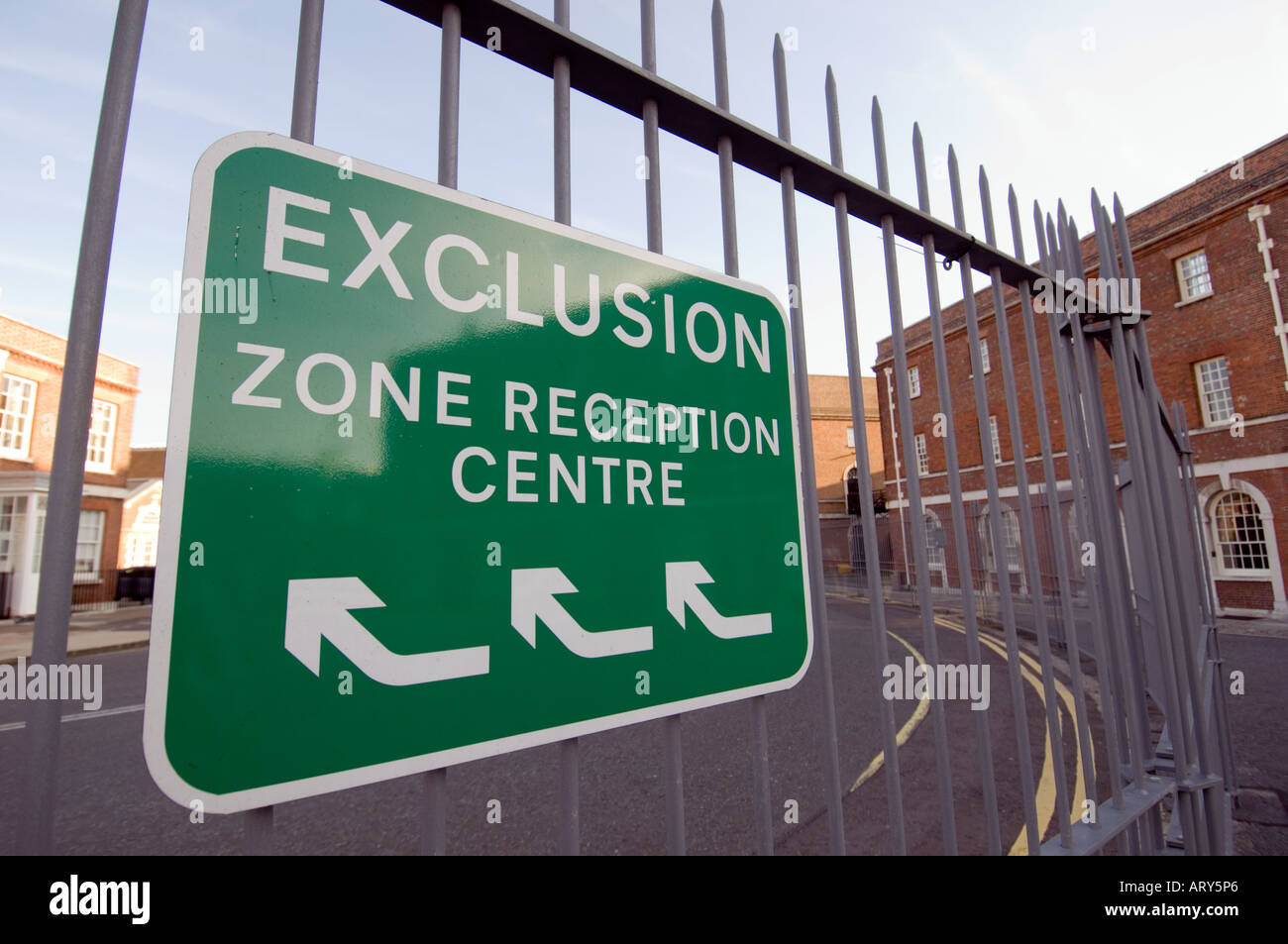exclusion zone sign with security fence Stock Photo - Alamy