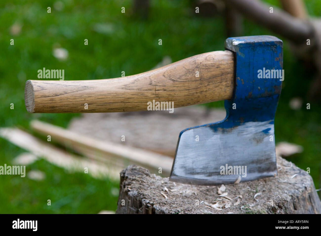 Hand axe embedded in chopping block Stock Photo - Alamy