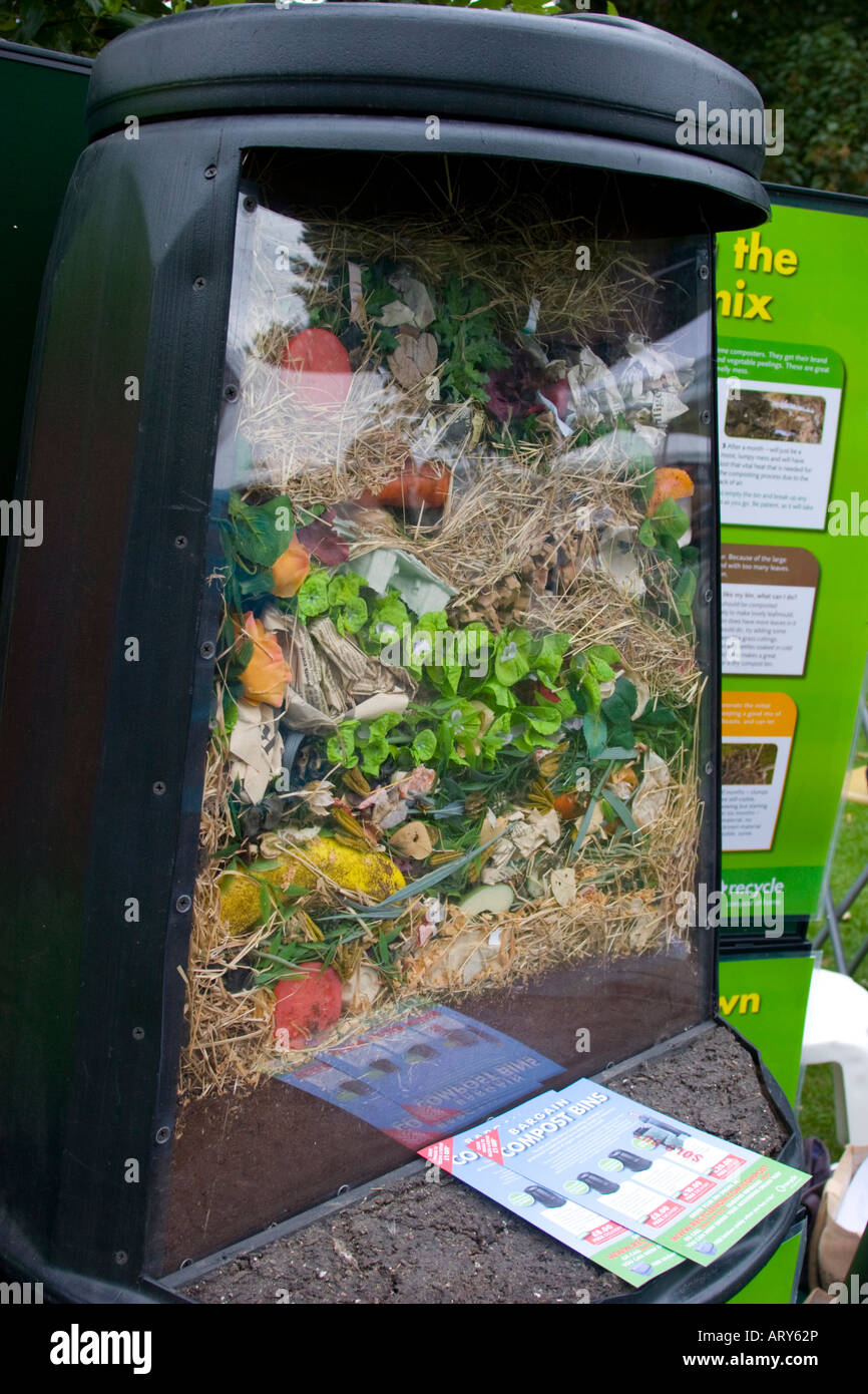 Cutaway compost bin to show section through rotting food waste inside ...