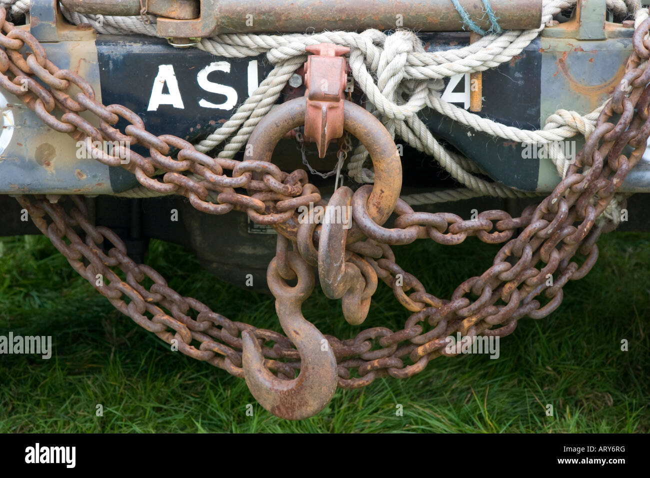 Heavy duty rusty chains and hooks on the front of an army vehicle Stock ...