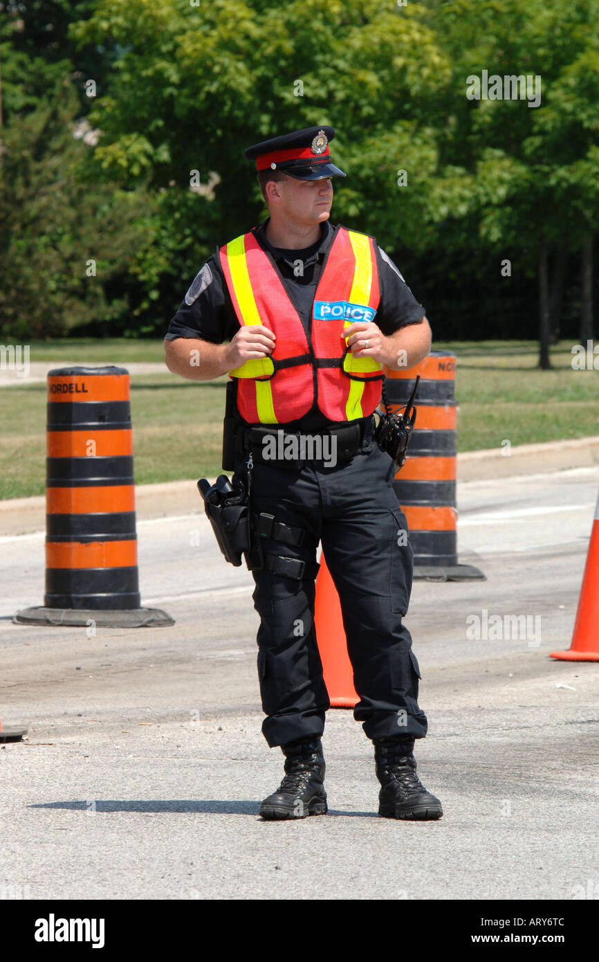 Canadian Police Officer on Traffic Duty wearing a high-visibility vest ...