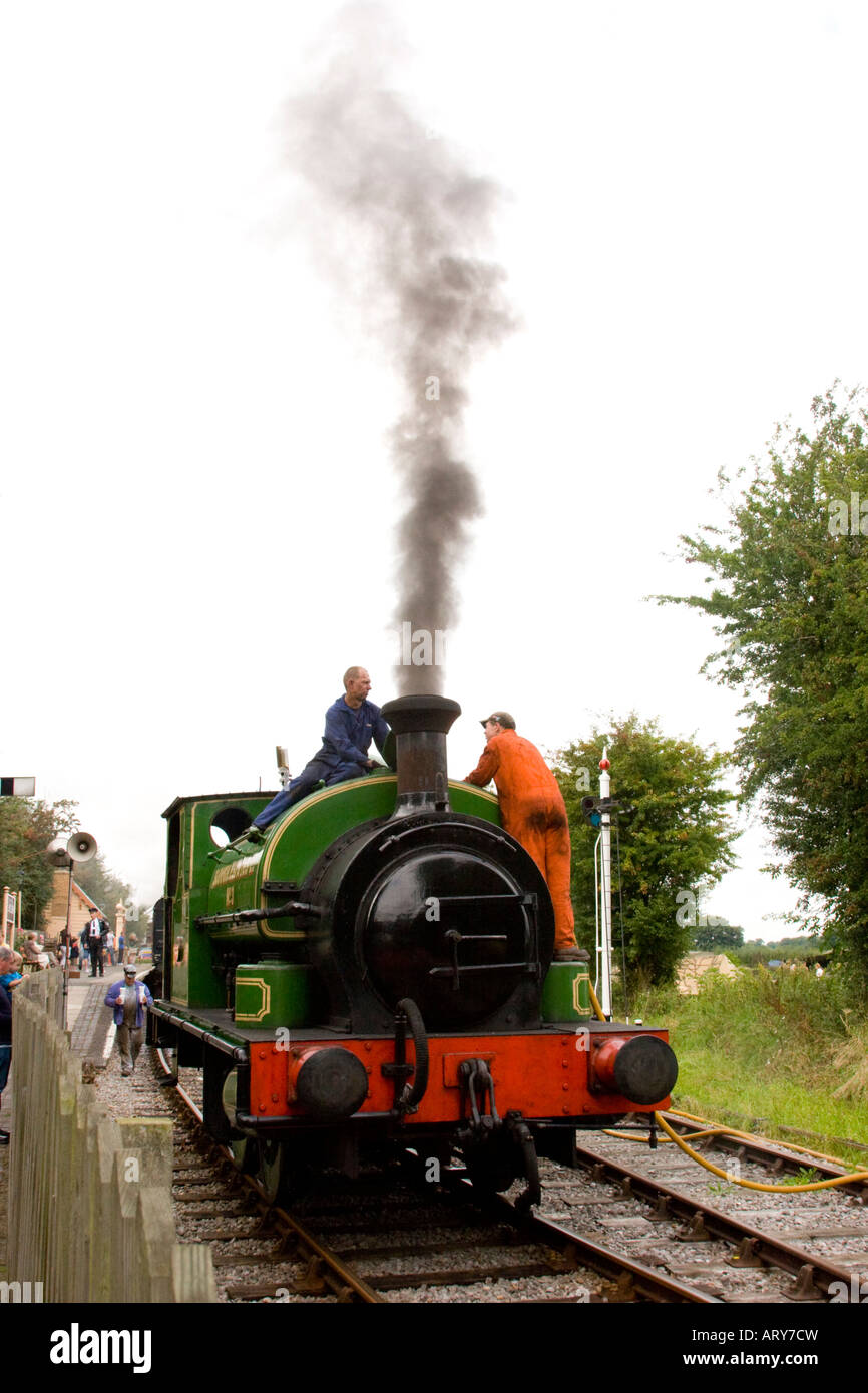 Men outside train stopped hi-res stock photography and images - Alamy